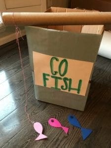 Make A DIY Go Fishing Game For Kids With A Cardboard Box